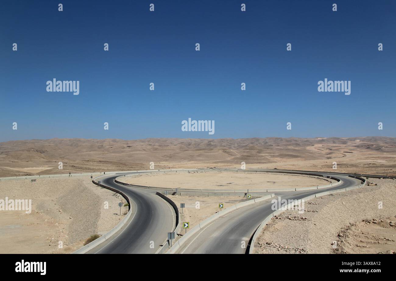 Desert scenery with the highway on the road trip from Hurghada to Cairo ...