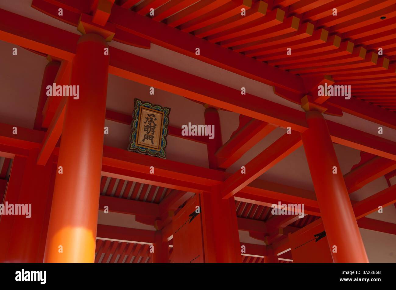 Architectural detail of the vermilion column structure and roof ...