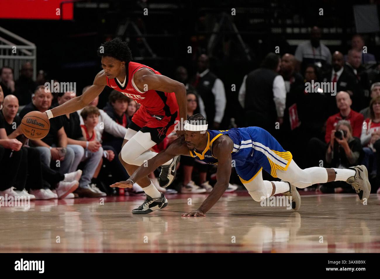 Houston Rockets forward Amen Thompson (1) takes control of the ball ...