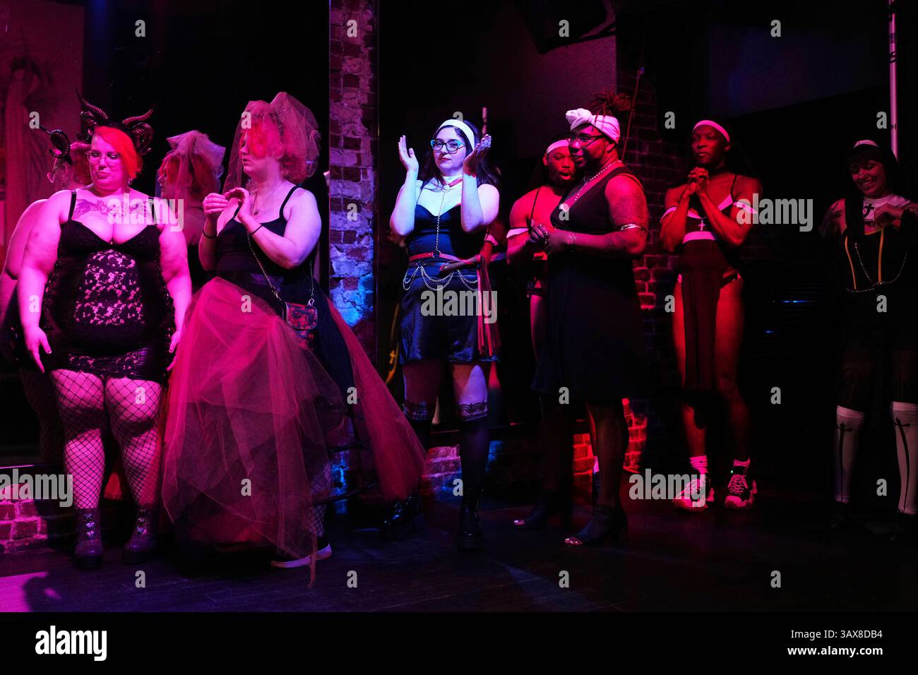 People participate in a nun costume contest during a "Bad Habits ...