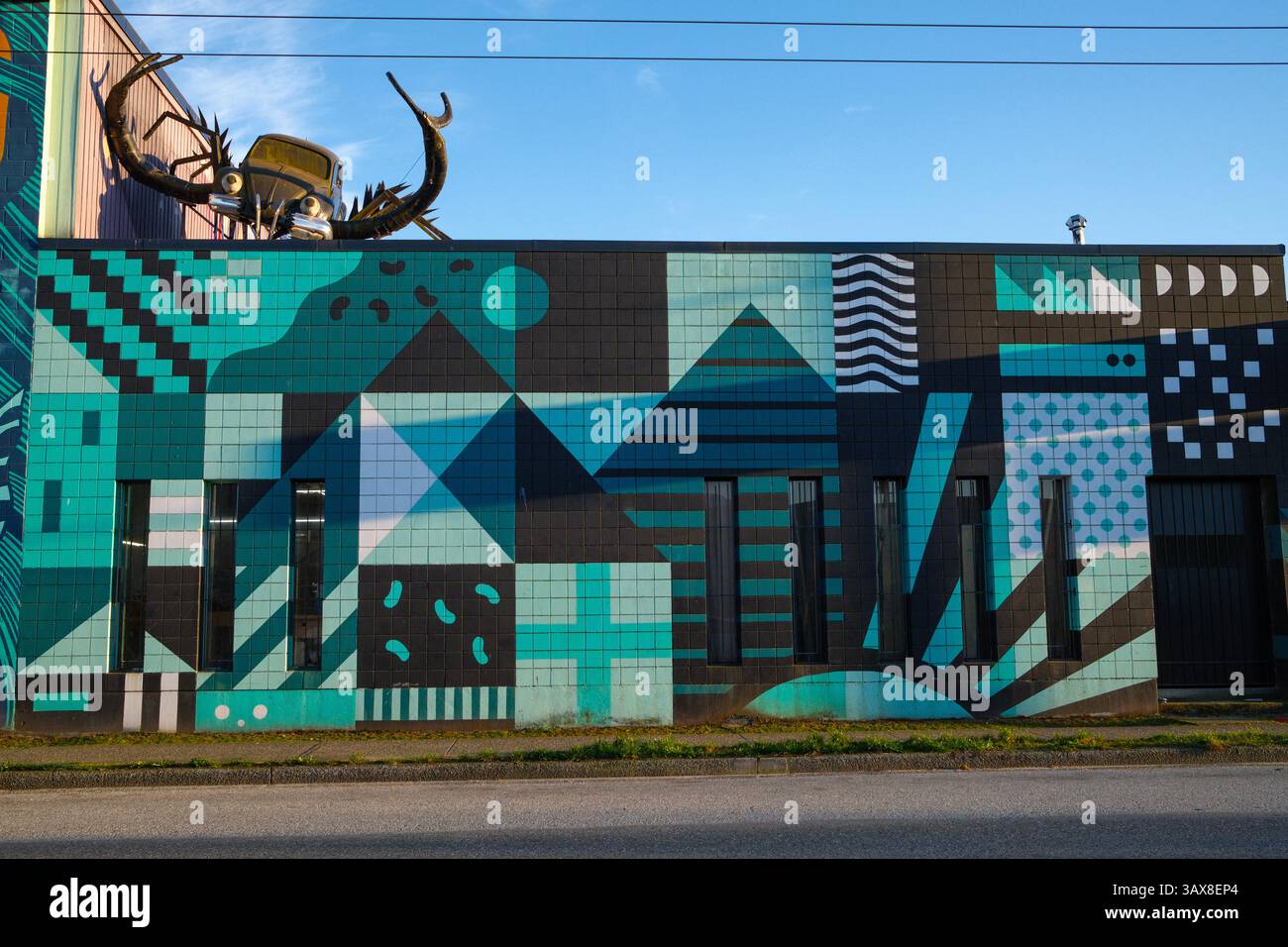 A building with a beautiful mural along East Cordova Street in ...