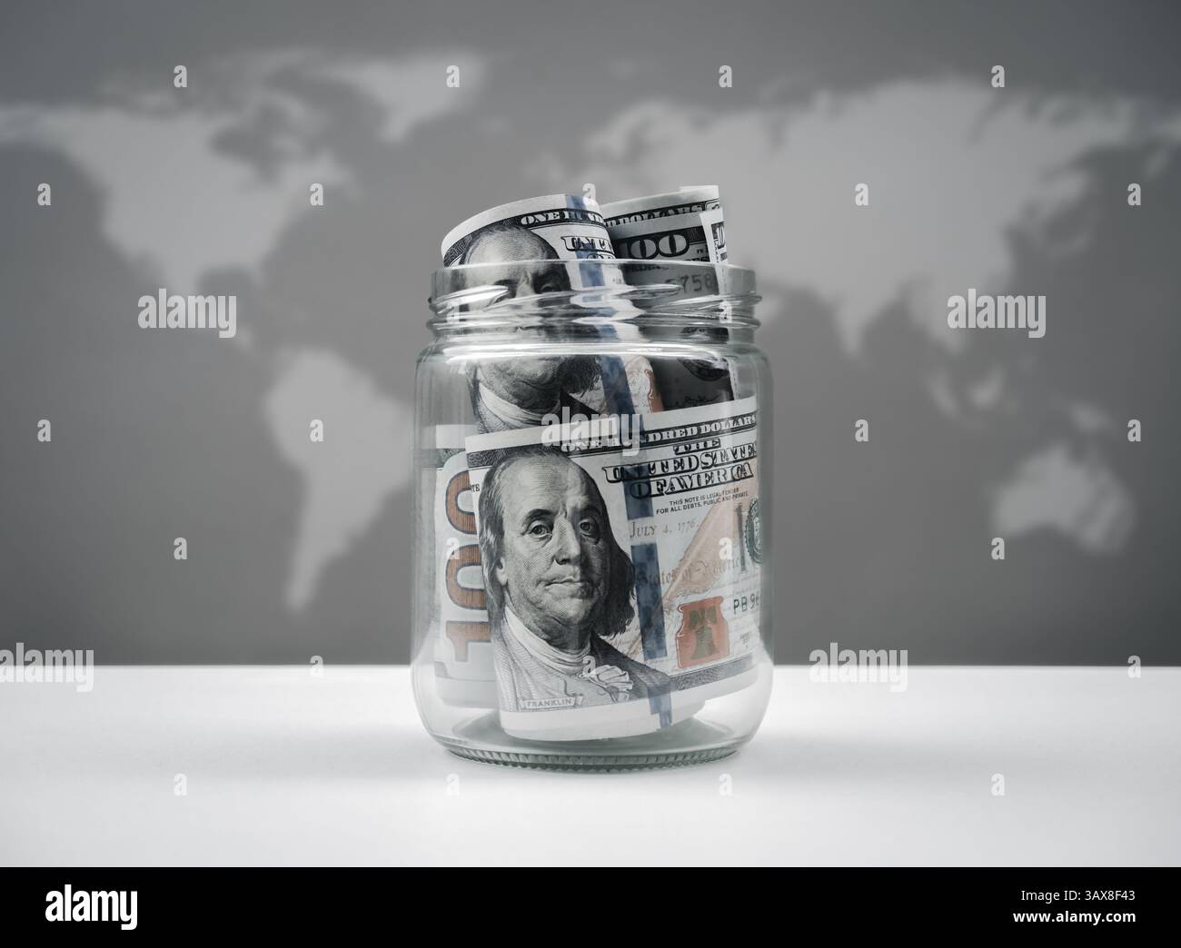 American dollars, bill banknotes money cash inside glass jar isolated ...