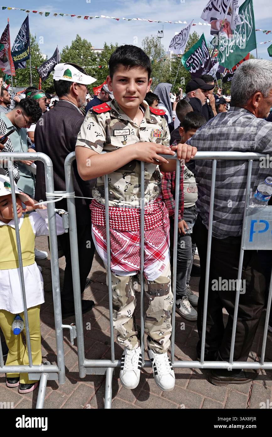 A young man is seen attending the event in Diyarbakir in a Palestinian ...