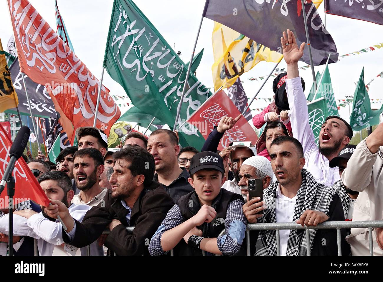 Participants of the celebration in Diyarbakir are seen carrying ...