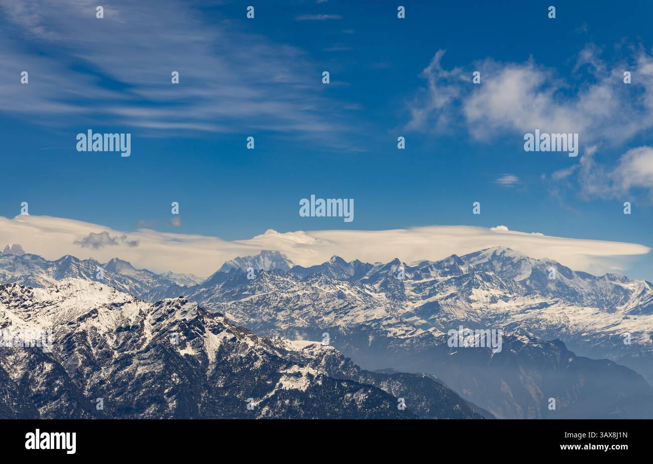 snowcap mountain range with bright blue sky at morning Stock Photo - Alamy