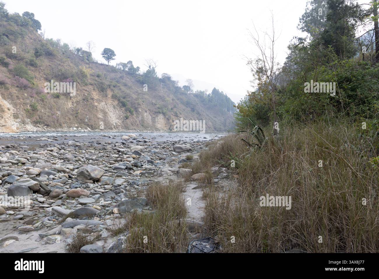 mountainous rocky river bed with small stream from flat angle Stock ...