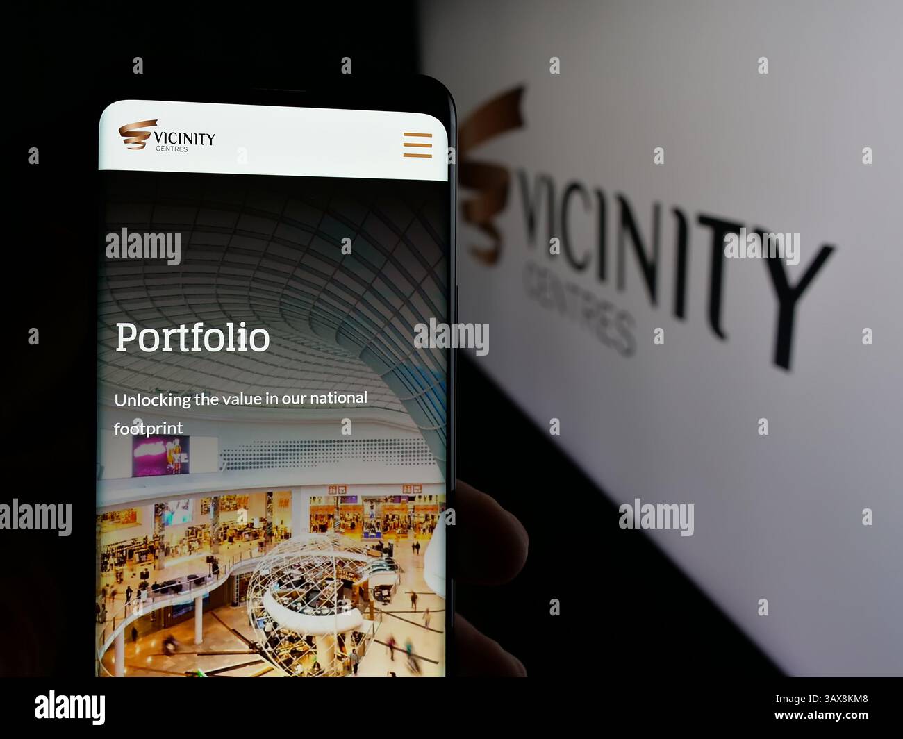 In this photo illustration, a person is holding a cellphone with the ...
