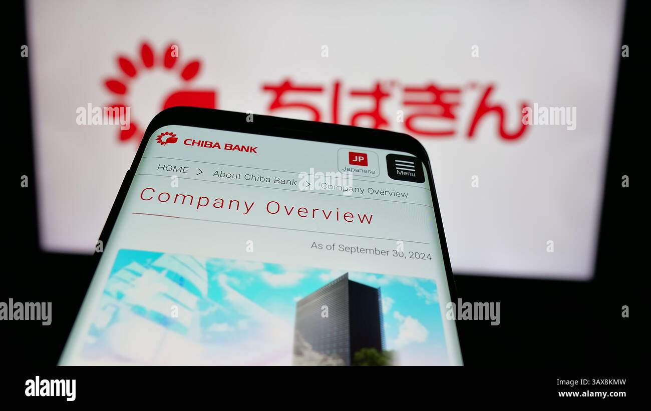 In this photo illustration, a mobile phone with the website of Japanese ...