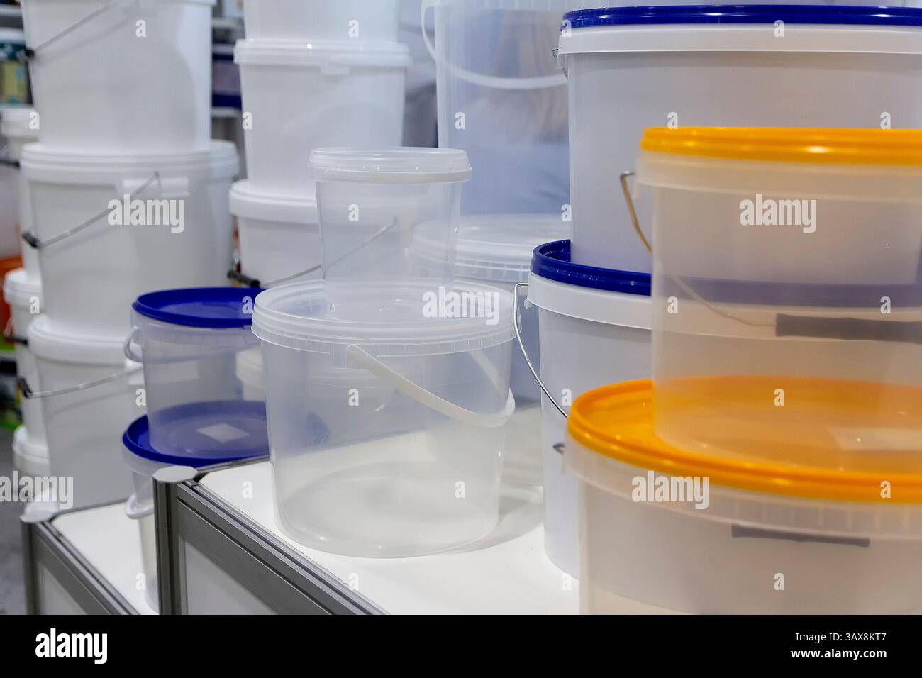 Plastic containers, packaging in a showcase. Industry Stock Photo - Alamy