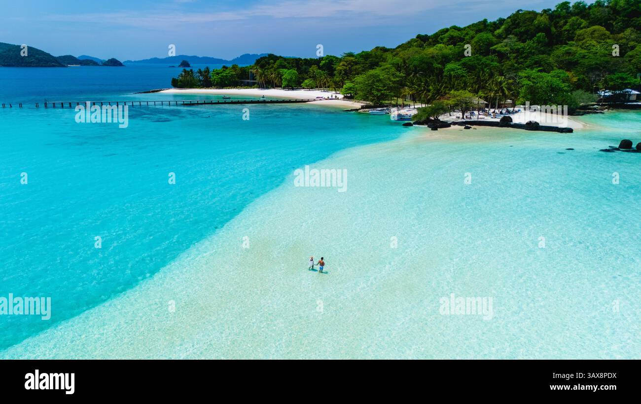 Experience the serene beauty of Koh Kham Island in Thailand, where soft ...