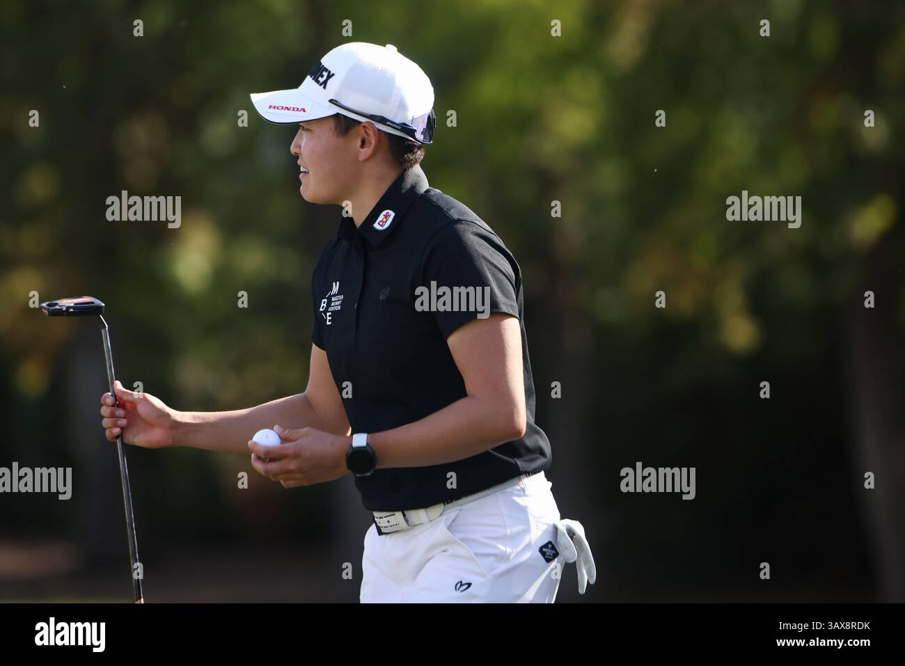 Akie Iwai reacts on the sixteenth green during the final round of the ...