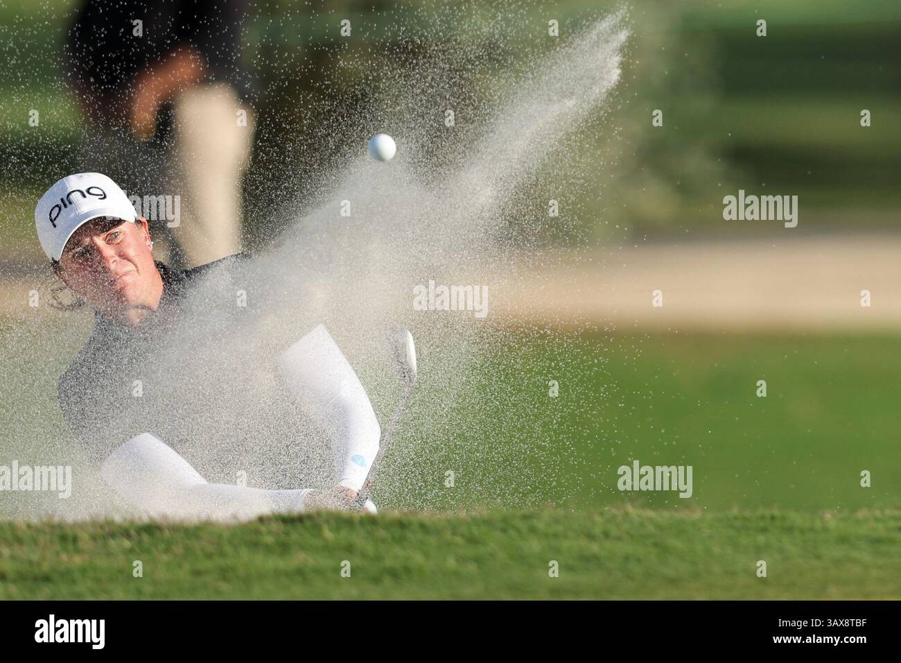 Lauren Coughlin hits from the bunker on the eighteenth hole during the ...