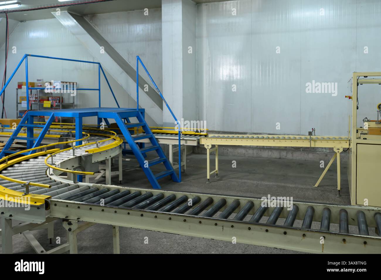 Empty conveyor belts in a food production facility Stock Photo - Alamy
