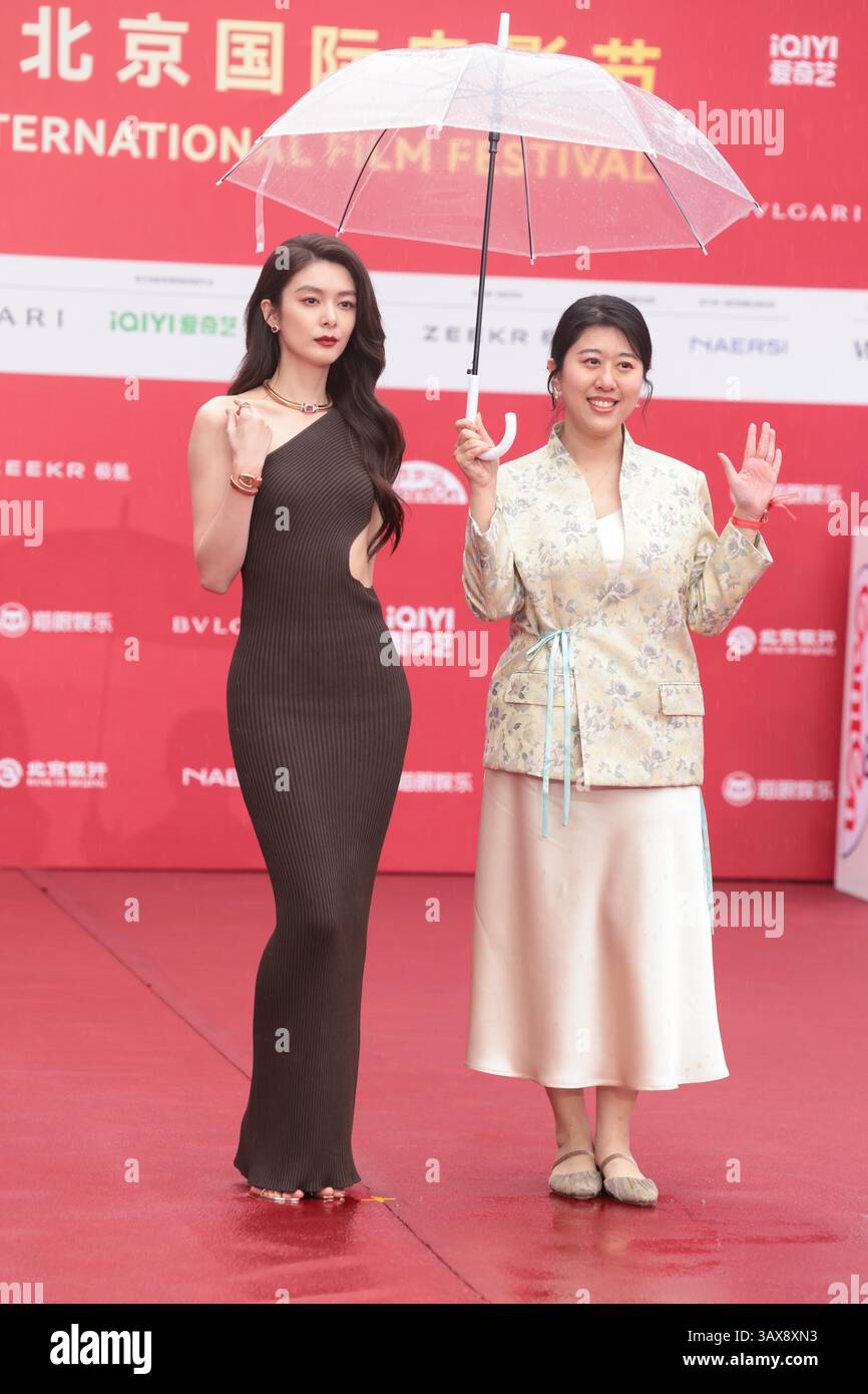 Chinese singer and actress Fu Jing (left) poses on the red carpet of ...