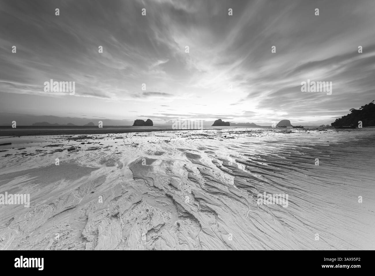 Structures in the sand, sunrise at low tide on the beach of Koh Ngai ...