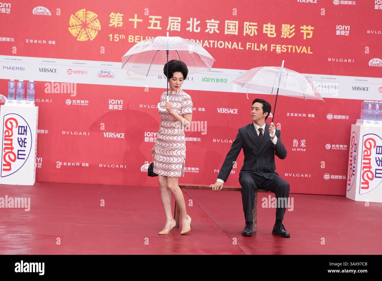 Chinese actress Zhang Yuqi (left) poses on the red carpet of the opening ceremony of the 15th ...