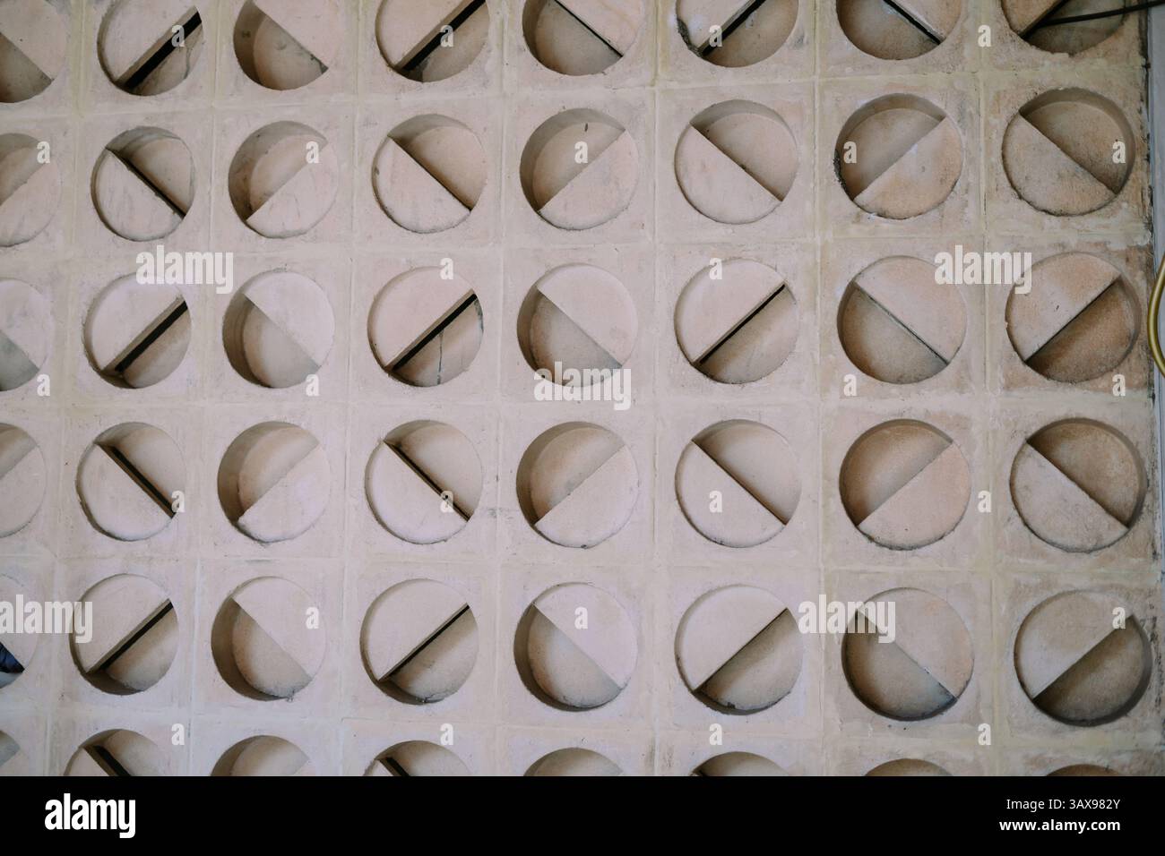 Detailed architectural concrete wall. Geometric pattern featuring ...