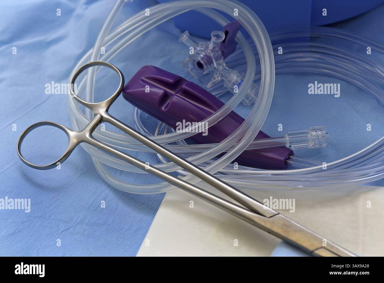 Grain tongs, three-way stopcock, medical tubing Stock Photo - Alamy