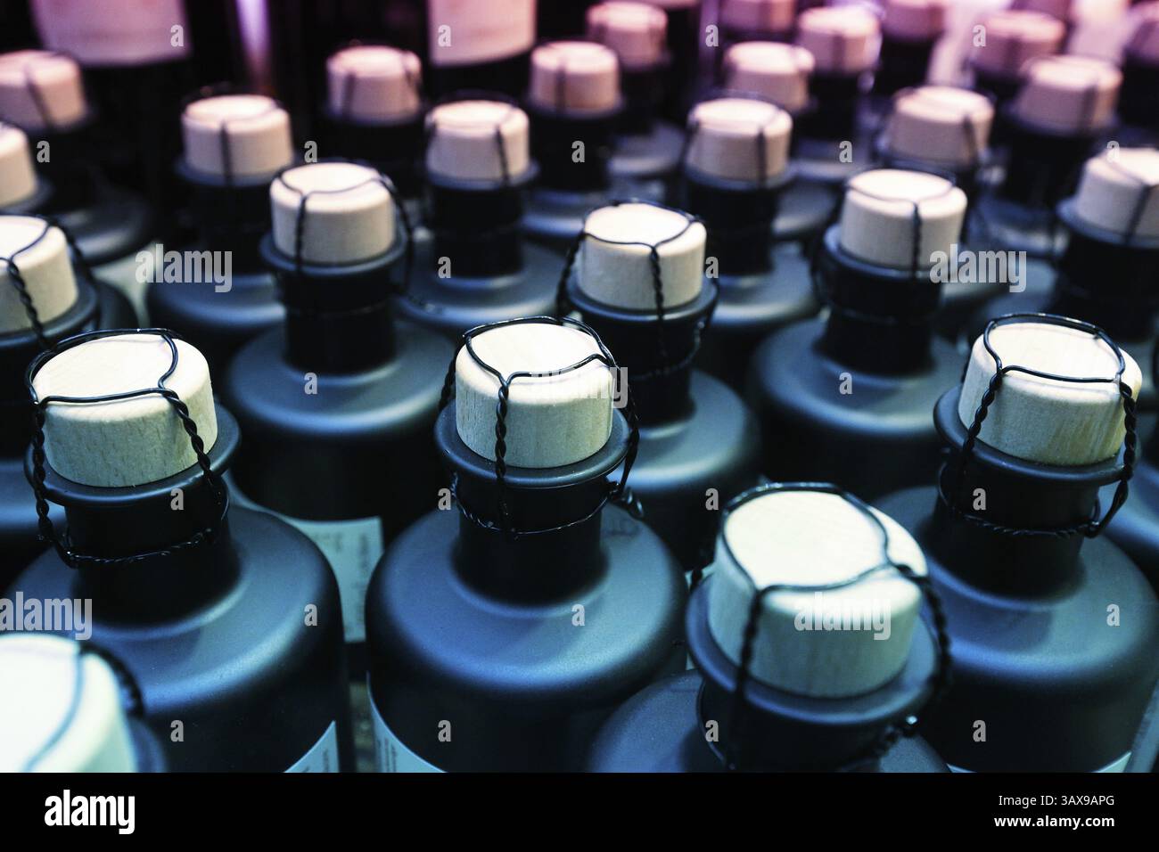Small bottles, sealed with corks and wire Stock Photo - Alamy