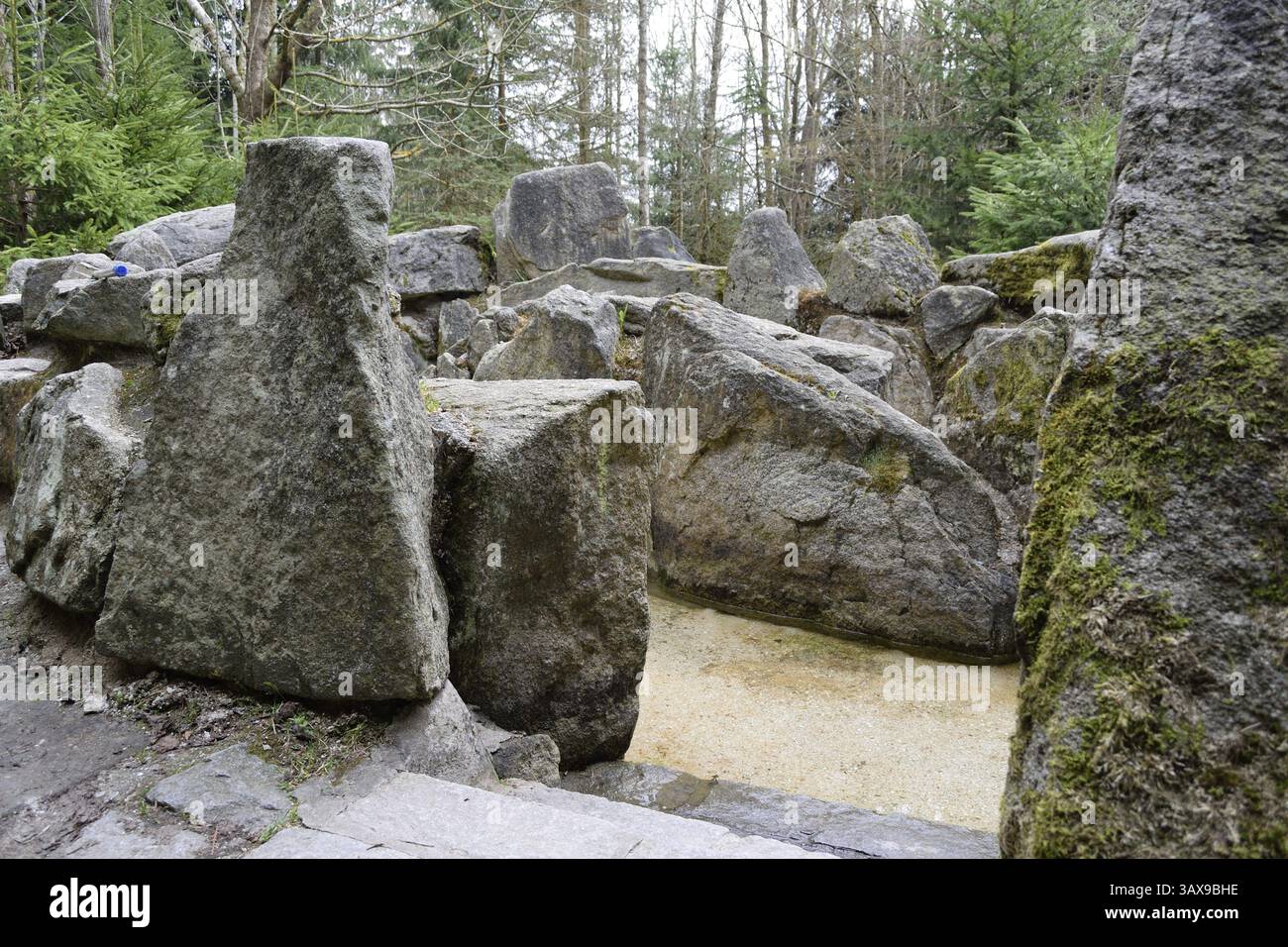 Large stones form a natural water treading pool Stock Photo - Alamy
