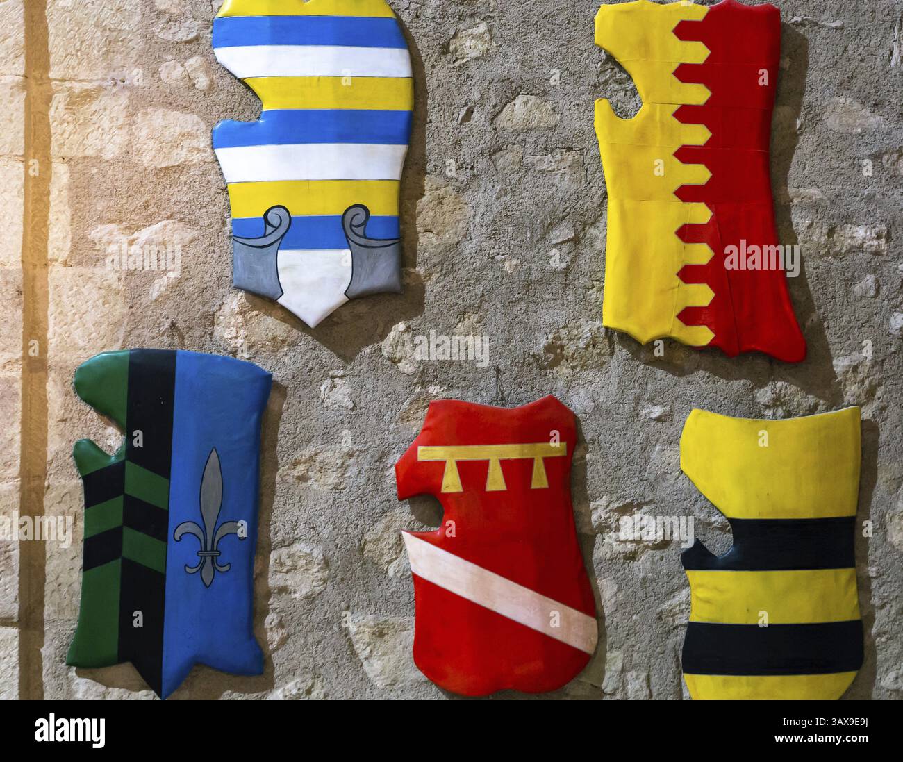 The medieval shields inside an ancient castle Stock Photo - Alamy