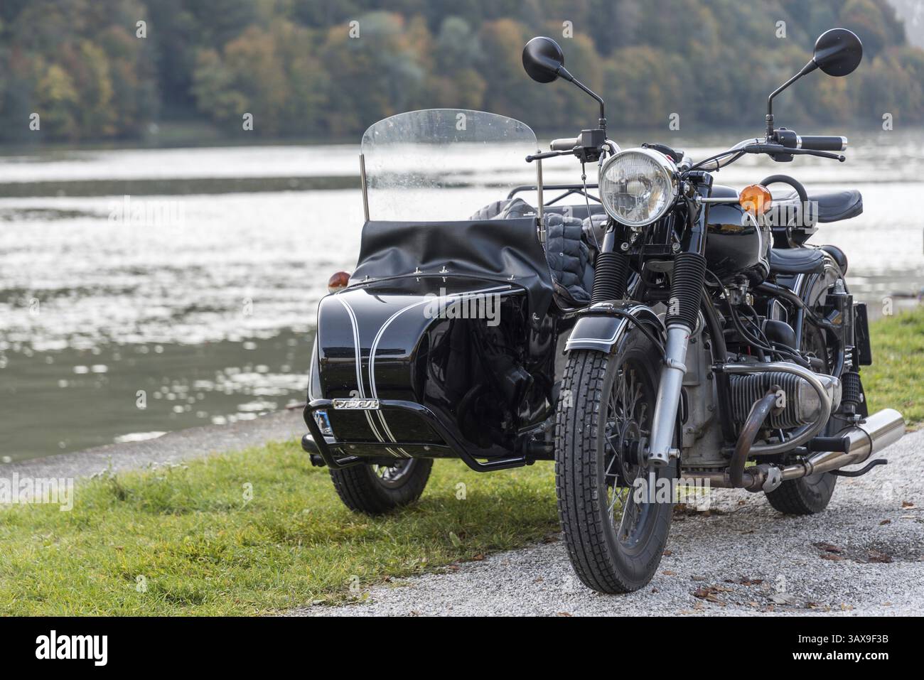 Motorbike with sidecar parked on an idyllic side road - sidecar bike ...