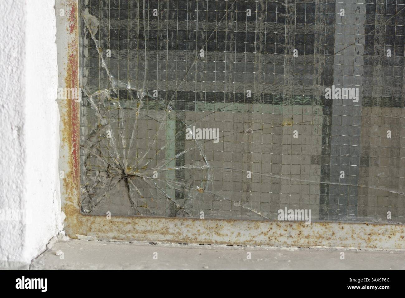 Broken glass pane shows cracks - broken safety glass with cracks Stock ...