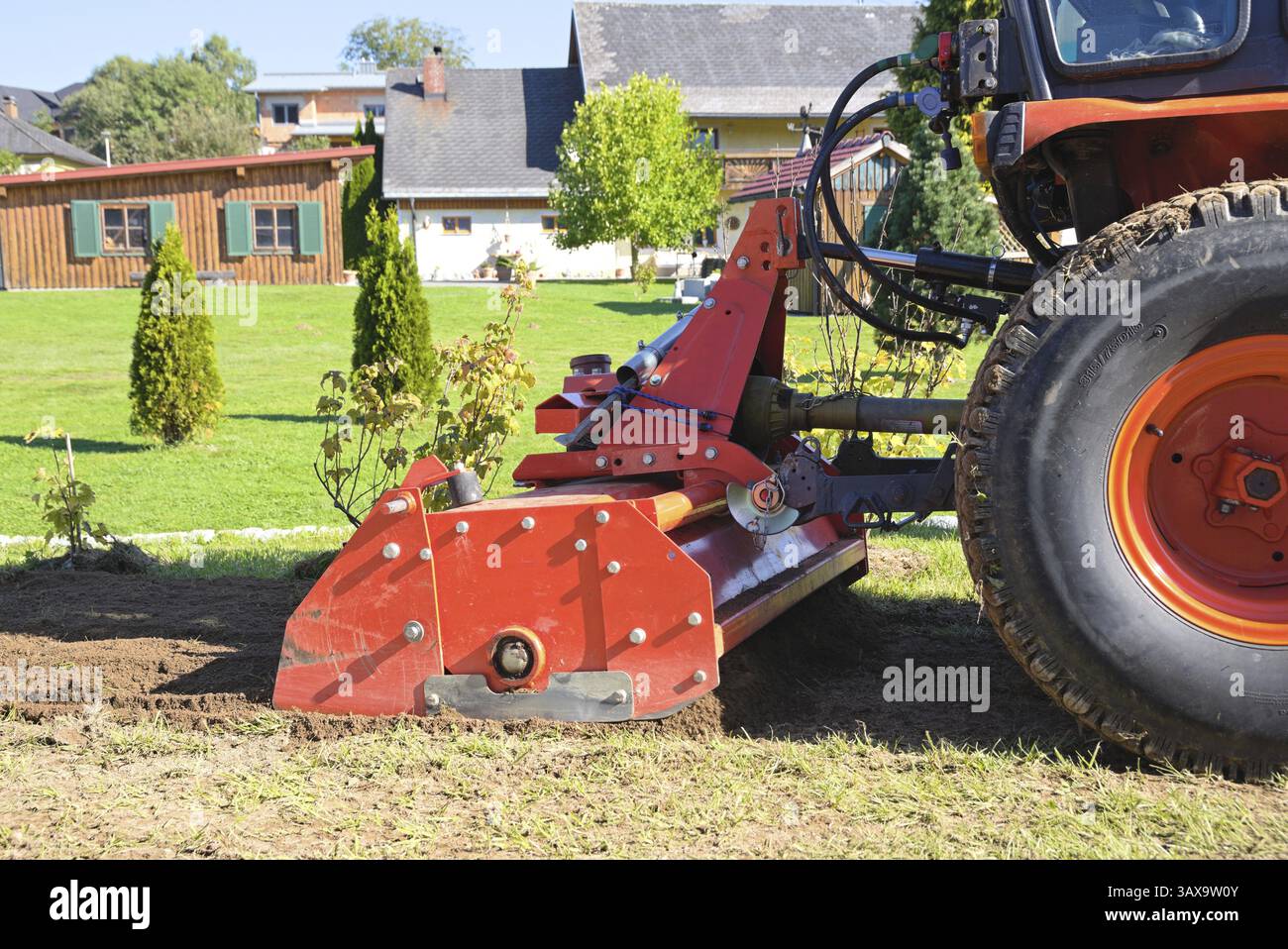 Loosening the soil with a reverse tiller and small tractor - Tiller ...