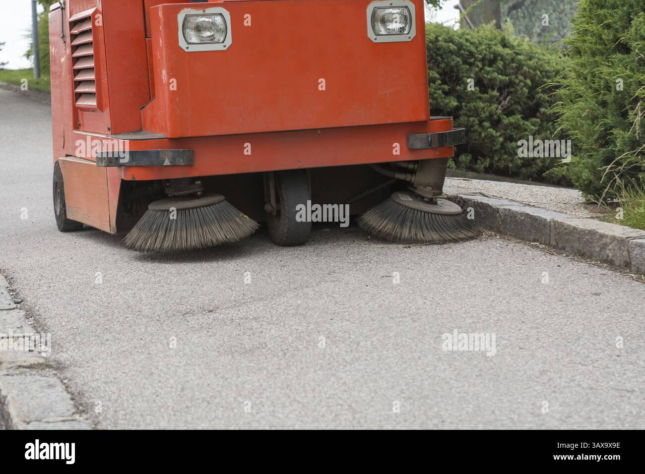 Cleaning the pavement with a road sweeper, Austria, Europe Stock Photo ...