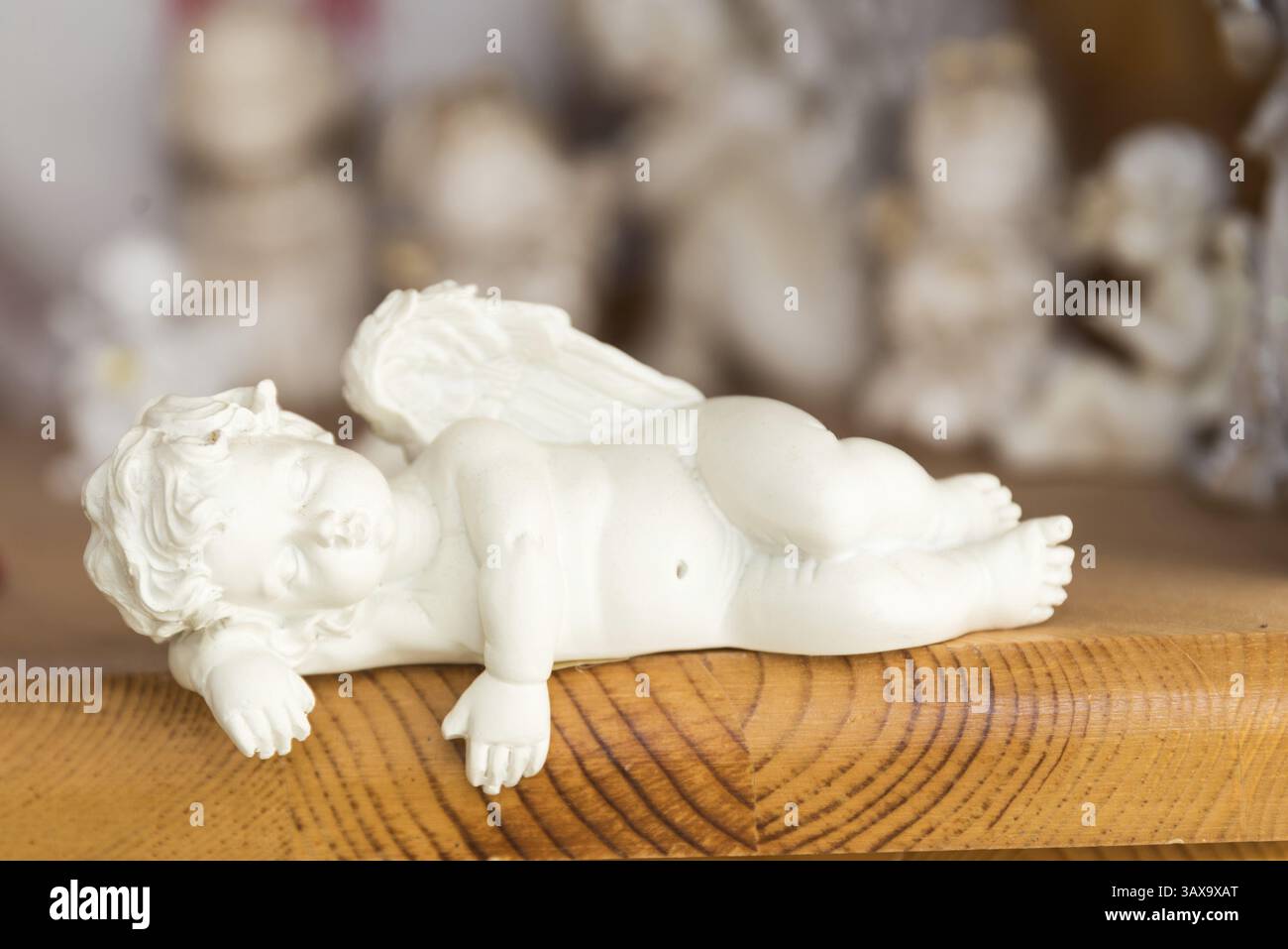 White angel figure lying hi-res stock photography and images - Alamy