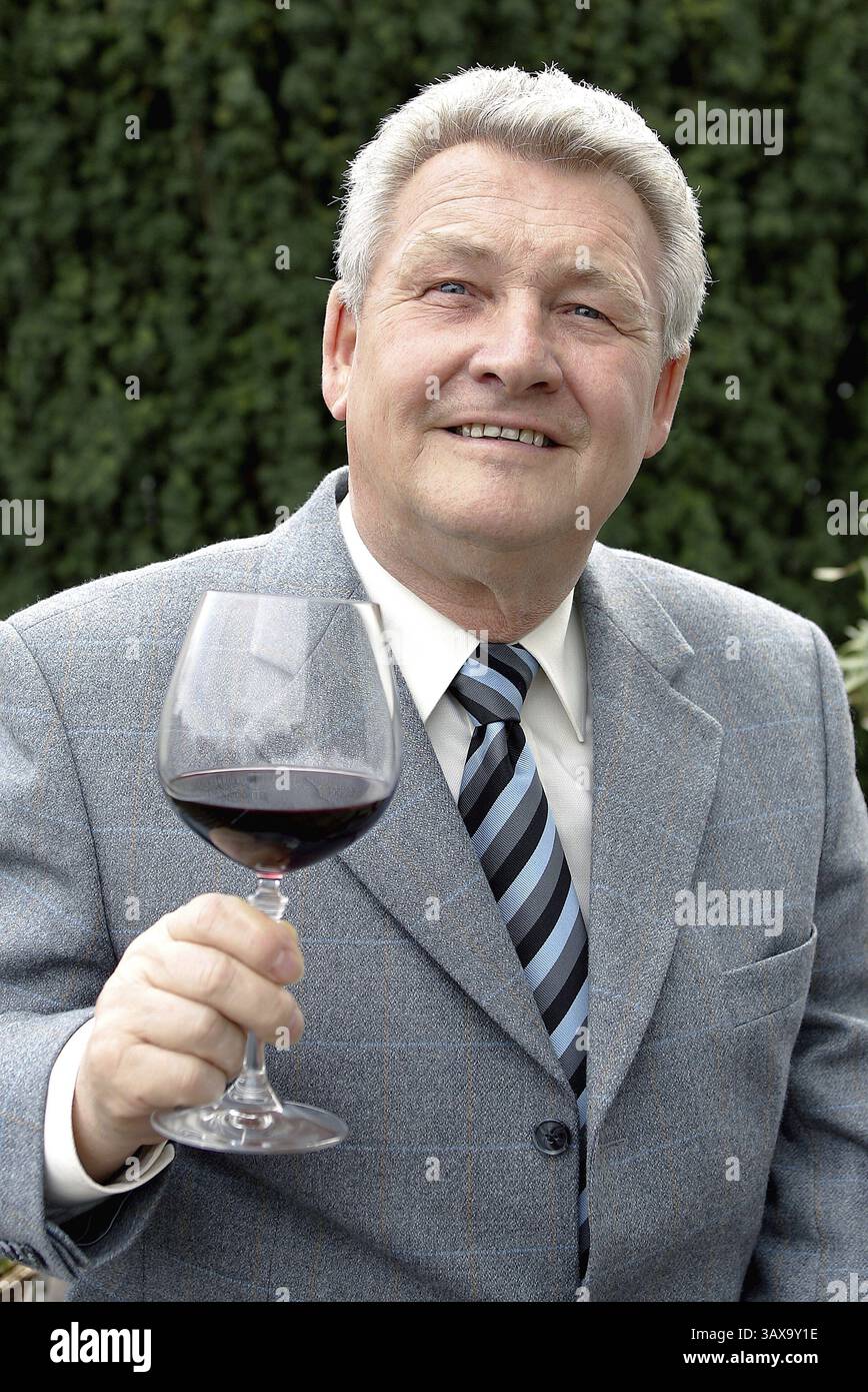 Older German man in suit with tie Stock Photo - Alamy