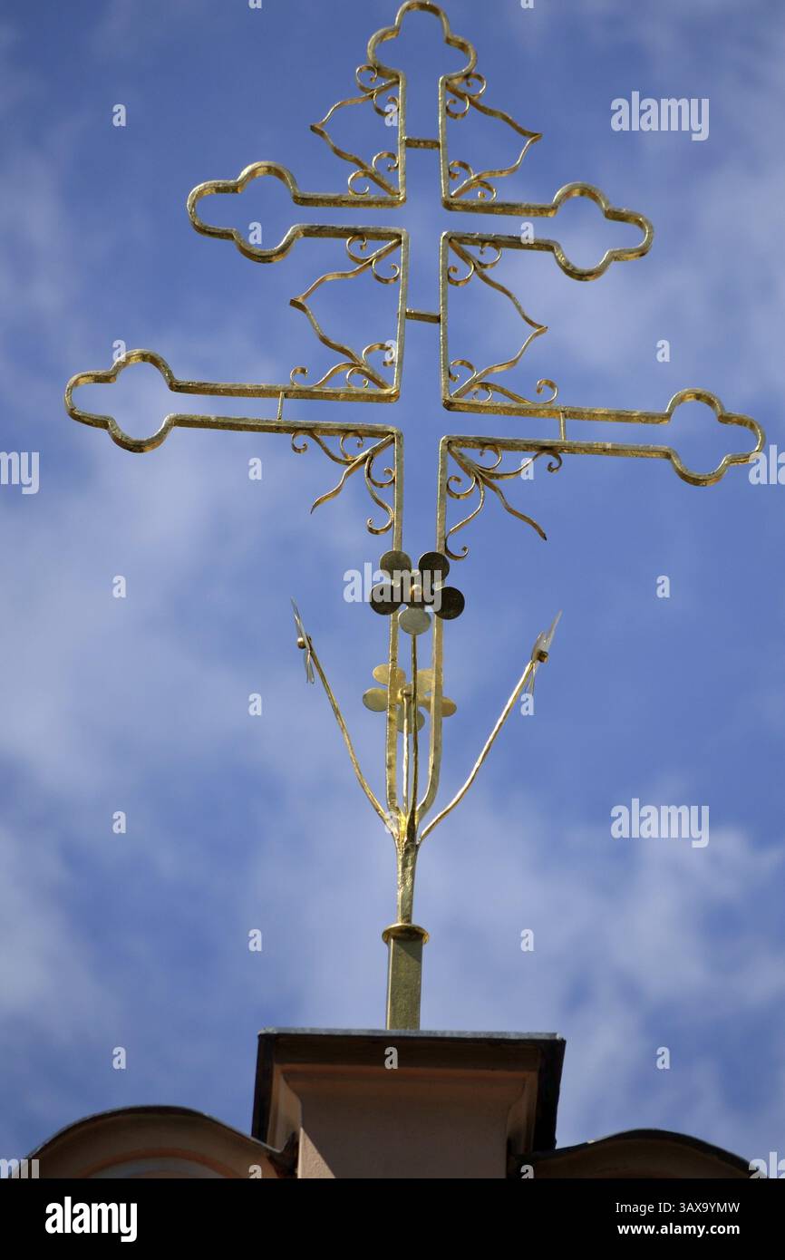 Church tower cross with a special shape Stock Photo - Alamy