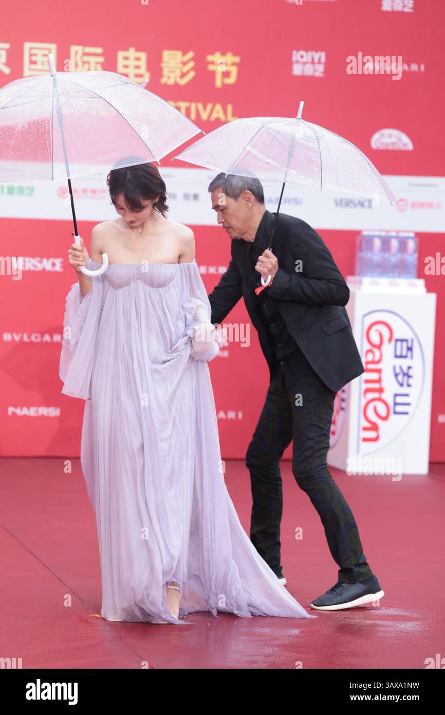 Chinese actress Gina Jin poses on the red carpet of the opening ...