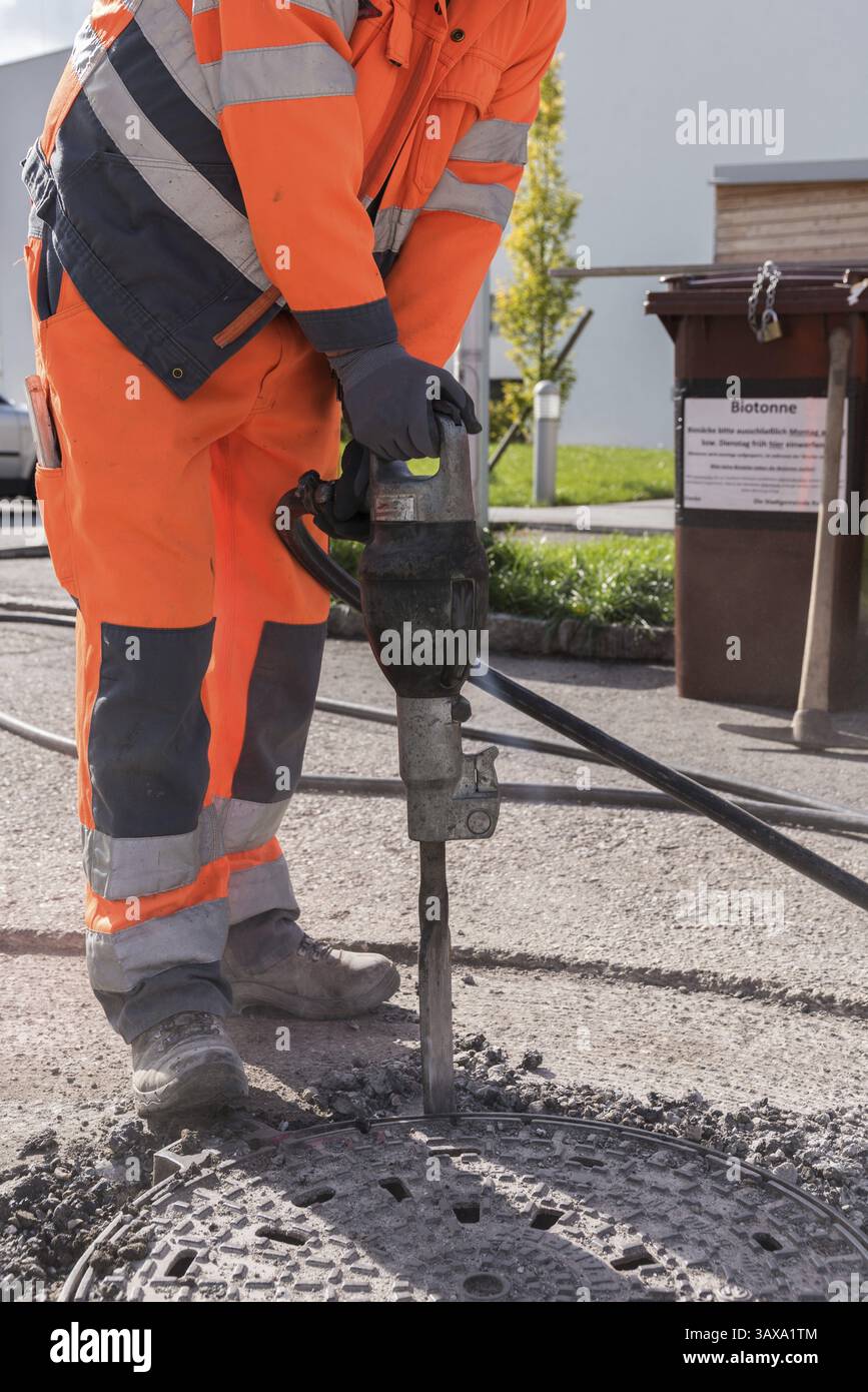 Labourer with a caulking hammer during piling work - close-up Stock ...