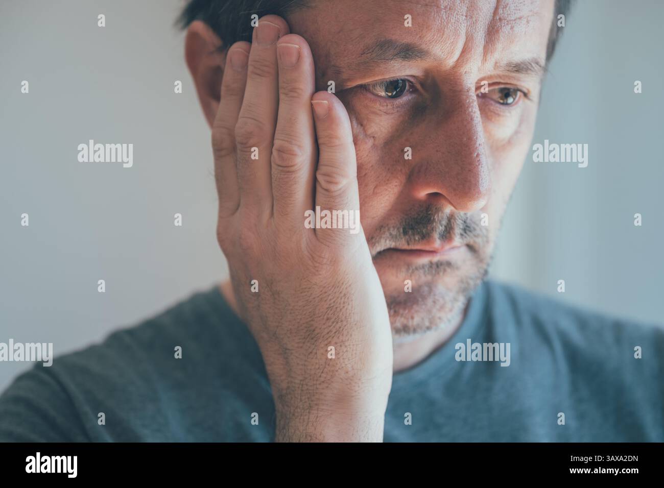 Toothache, portrait of mature adult male with aching tooth pressing his ...