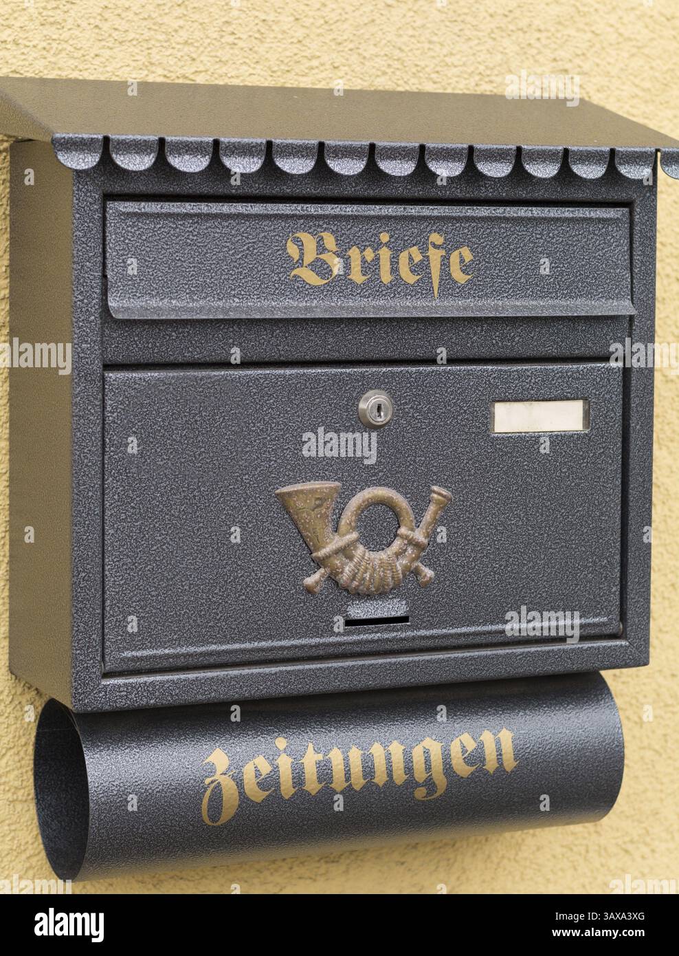 Metal letterbox and newspaper roll, Austria, Europe Stock Photo - Alamy