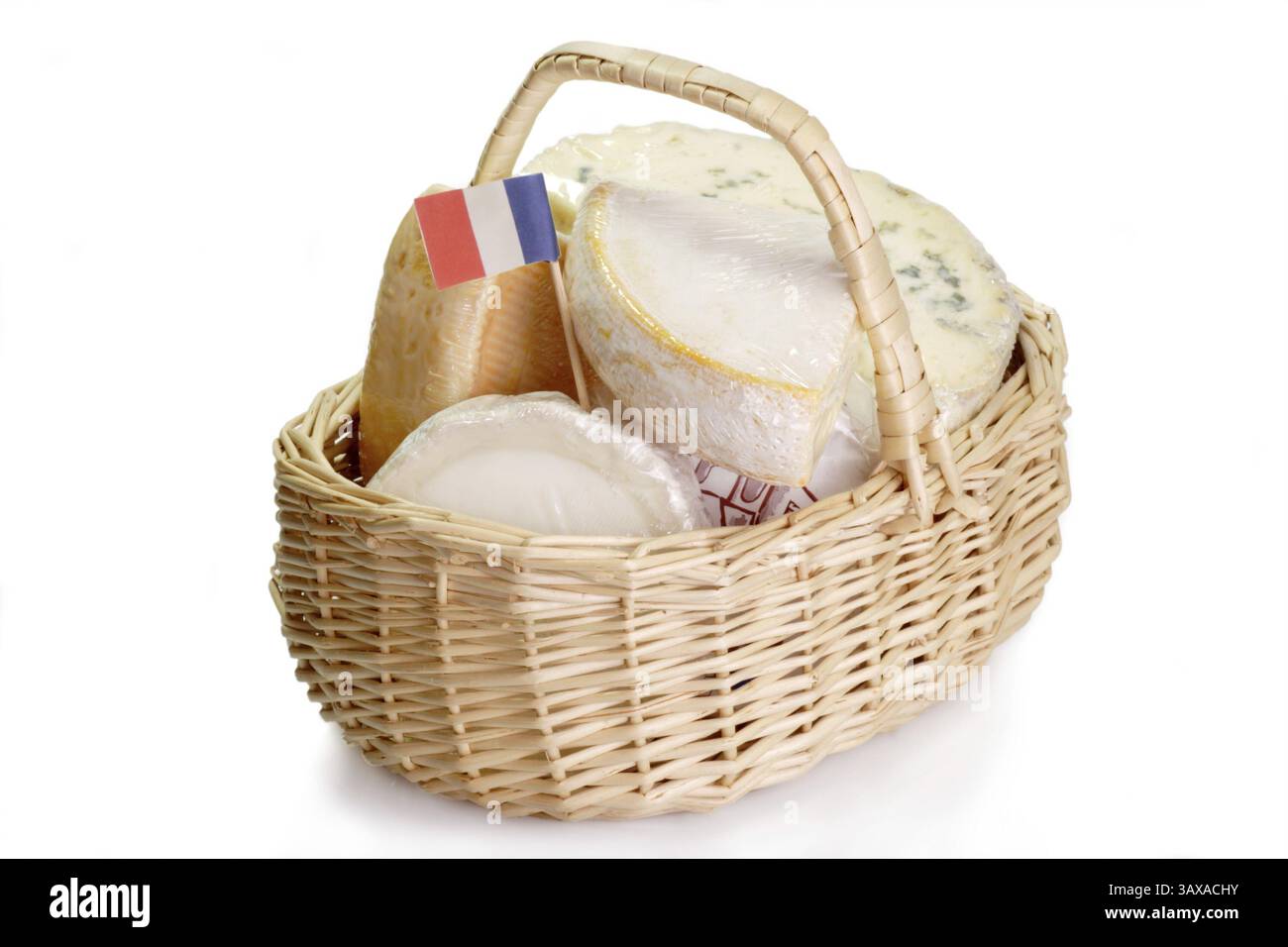 Packaged soft cheese in a basket on a white background Stock Photo - Alamy