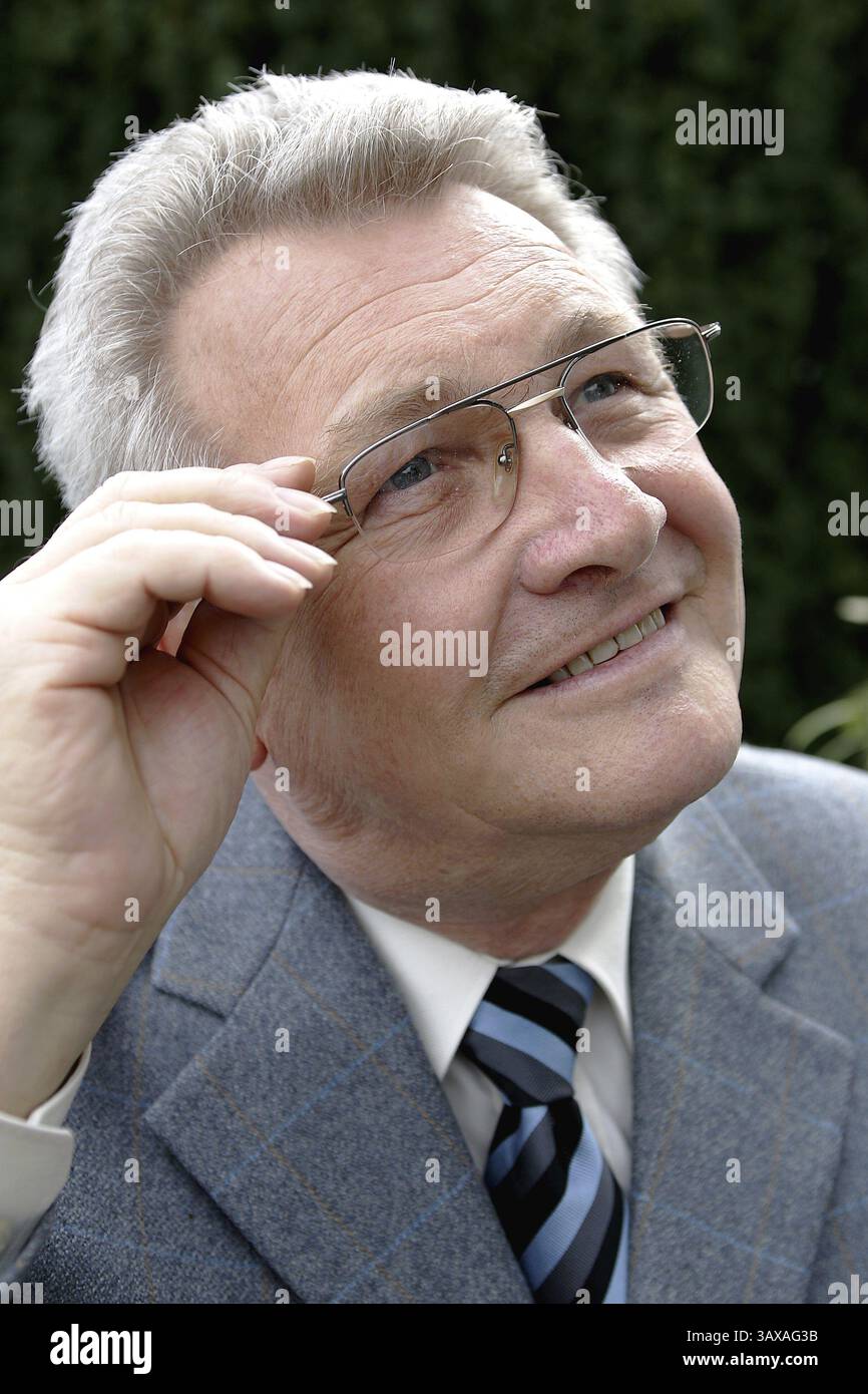Older German man in suit with tie Stock Photo - Alamy