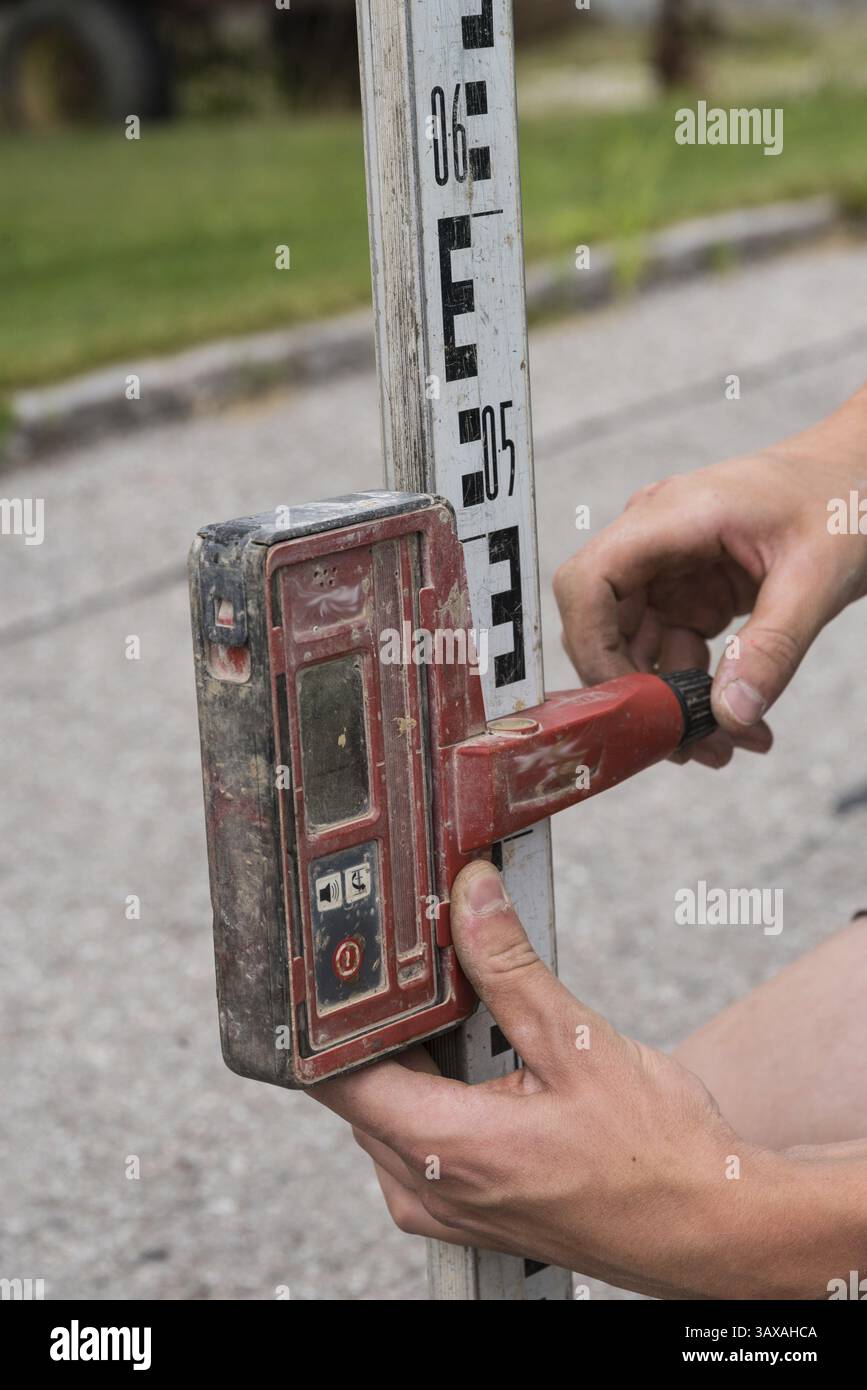 Measuring technology for surveying a building site - close-up of ...