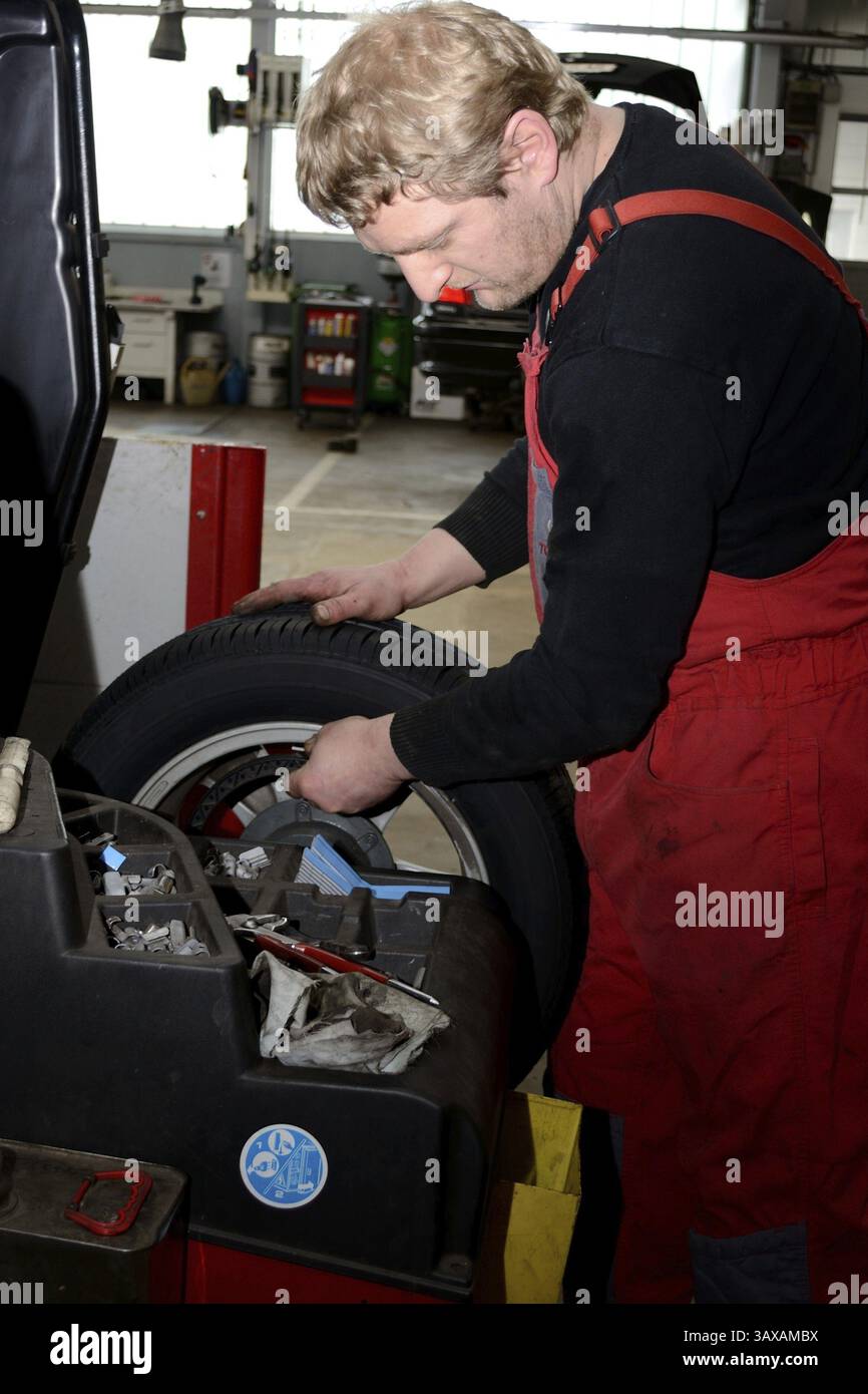 Mechanic works car part hi-res stock photography and images - Alamy
