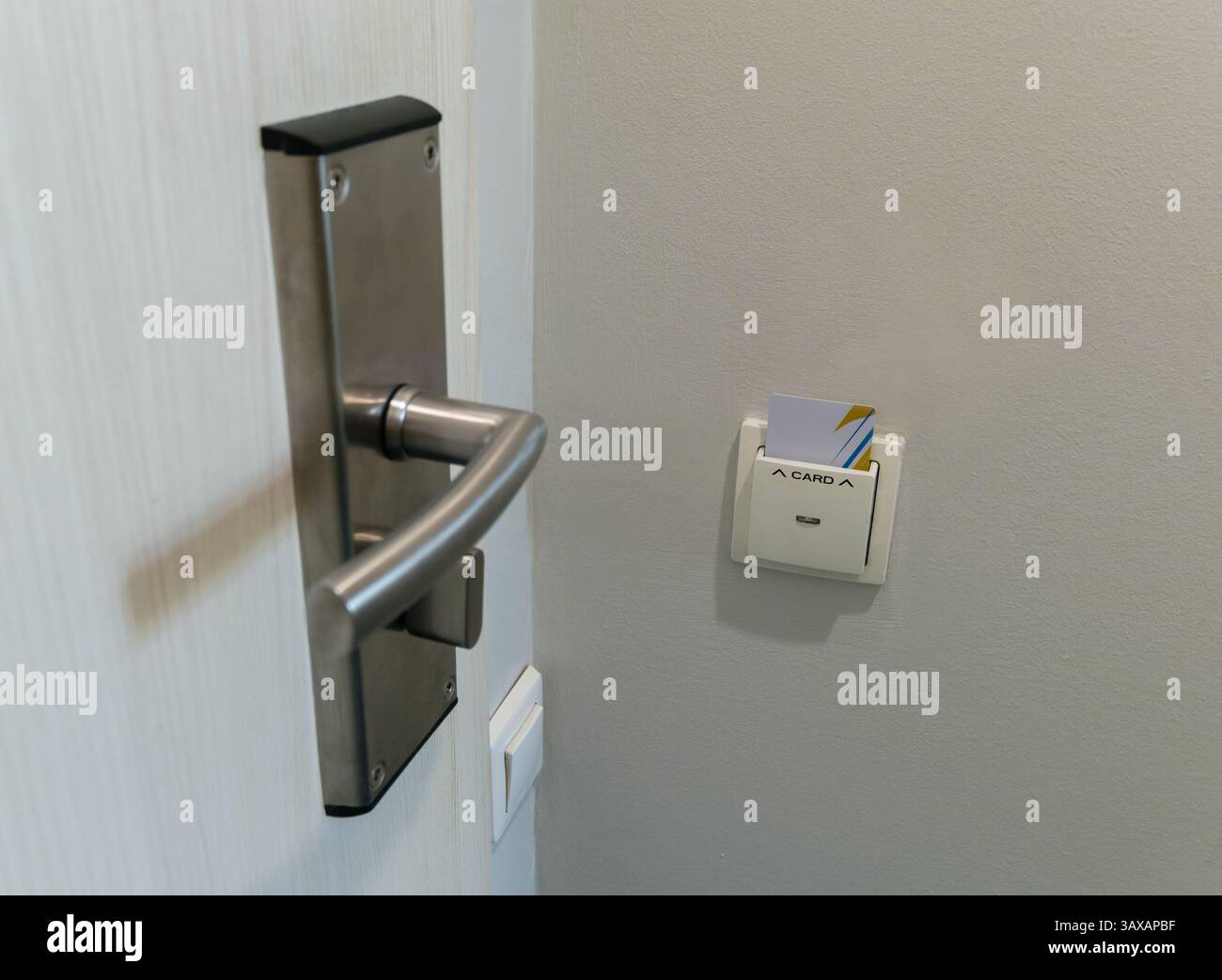 Electric lock with key card in a hotel room Stock Photo - Alamy