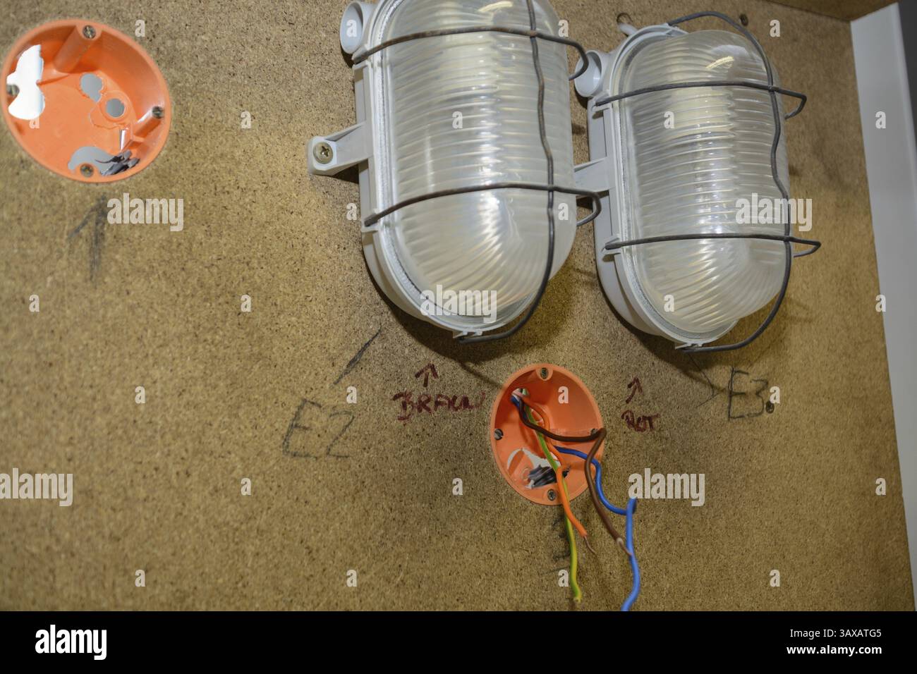 Lighting fixture mounted on an installation wall - close-up of cellar ...