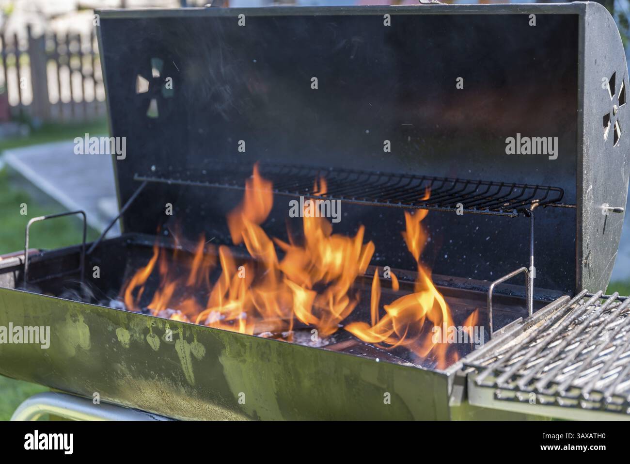 Wood and charcoal in the charcoal barbecue - barbecue fire and flame ...