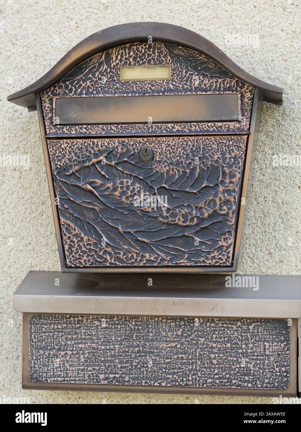 Metal letterbox and newspaper roll, Austria, Europe Stock Photo - Alamy