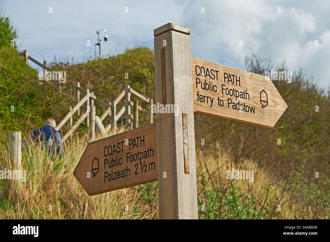 Timber finger post sign for the coastal path at Rock in North Cornwall ...