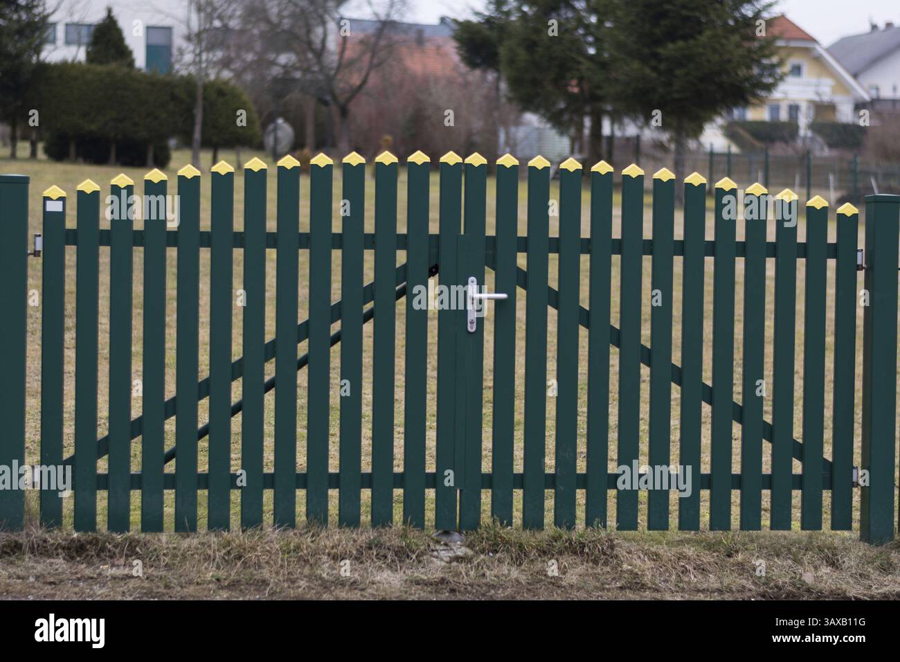 Decorative garden fence gate for entrance and exit Stock Photo - Alamy