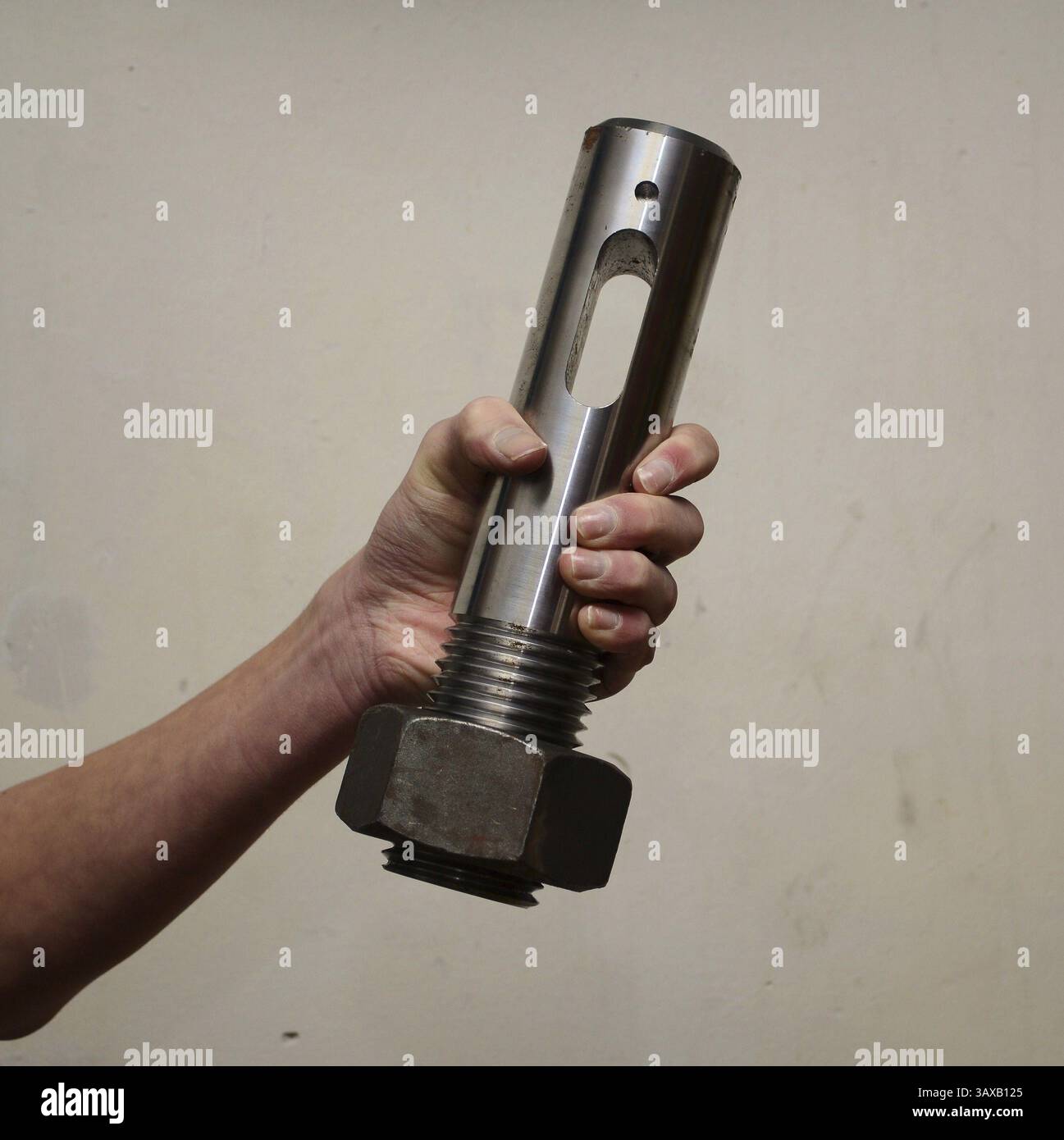 Oversized bolt with nut Stock Photo - Alamy