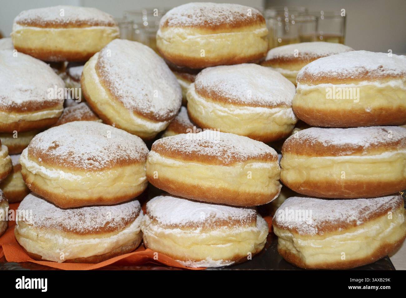 Tray with delicious carnival doughnuts Stock Photo - Alamy