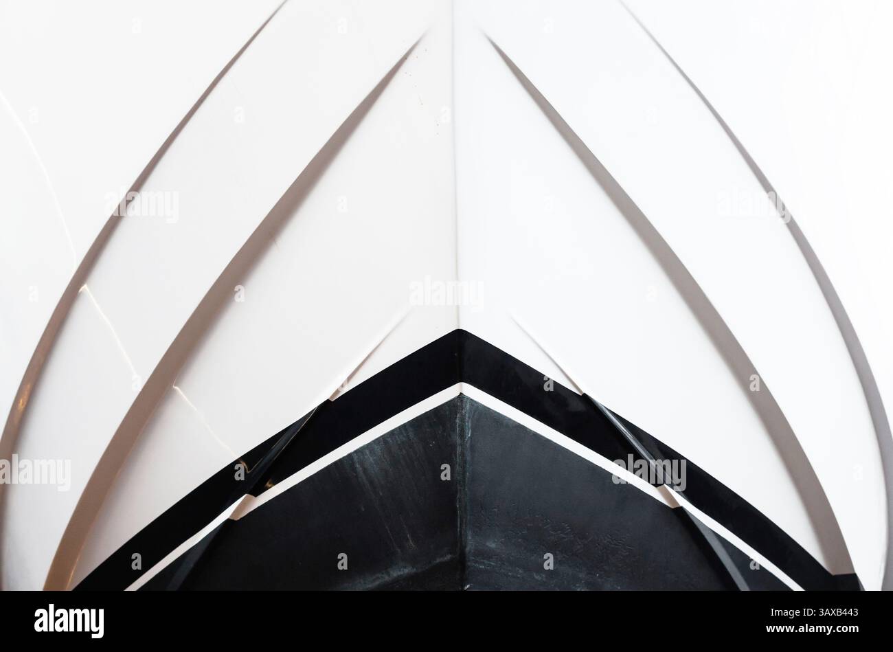 The bow of the yacht, bottom view, close-up. The waterline is clearly ...