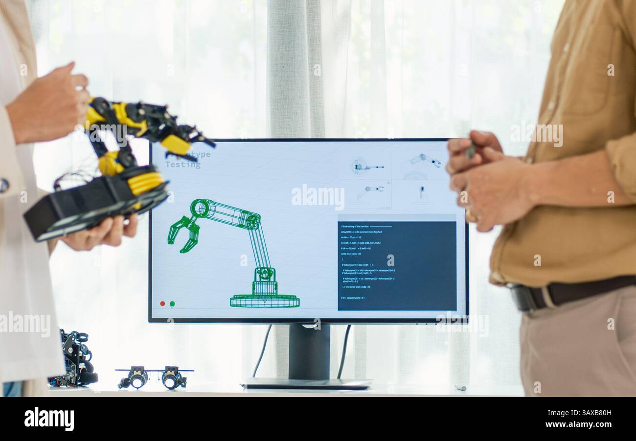 engineering robot technology with asian programmer innovation and research teamwork in coding ...